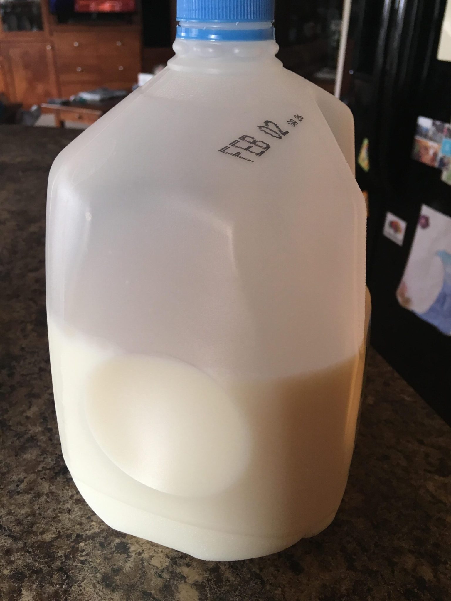 Purpose of the Circular Dent on Milk Jugs – I love…